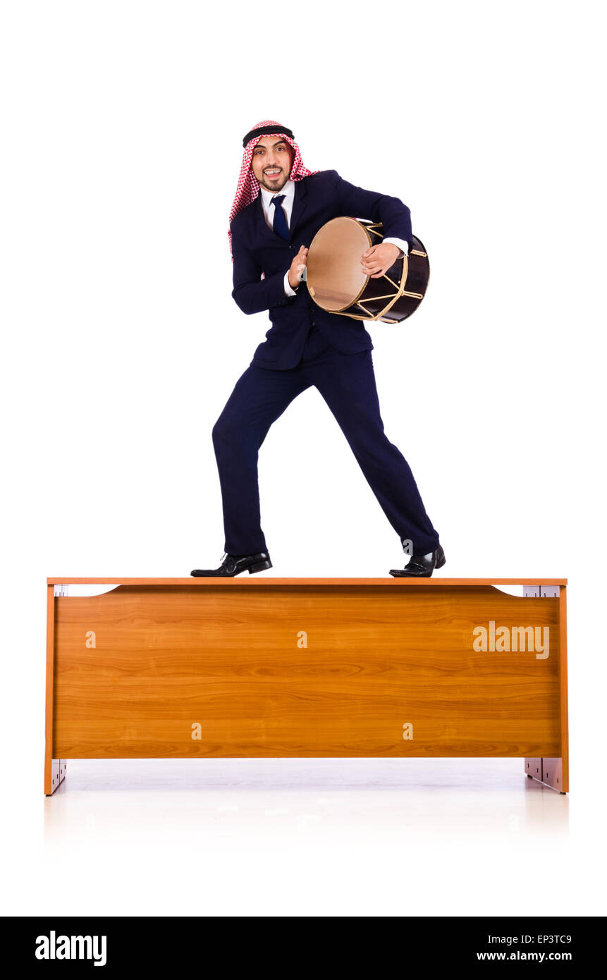 Arab businessman playing drum on desk Stock Photo - Alamy
