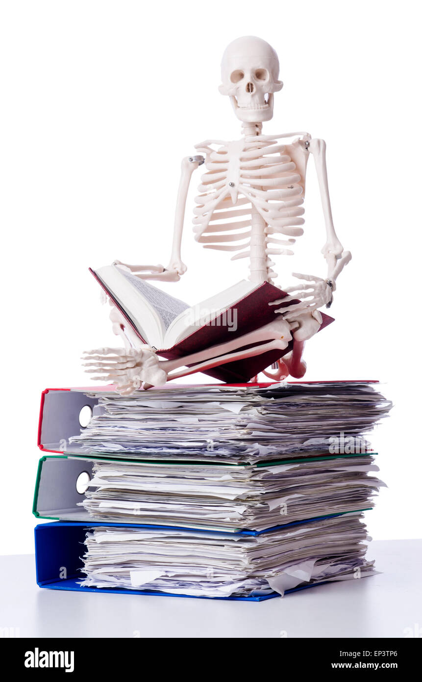 Skeleton with pile of files on white Stock Photo - Alamy