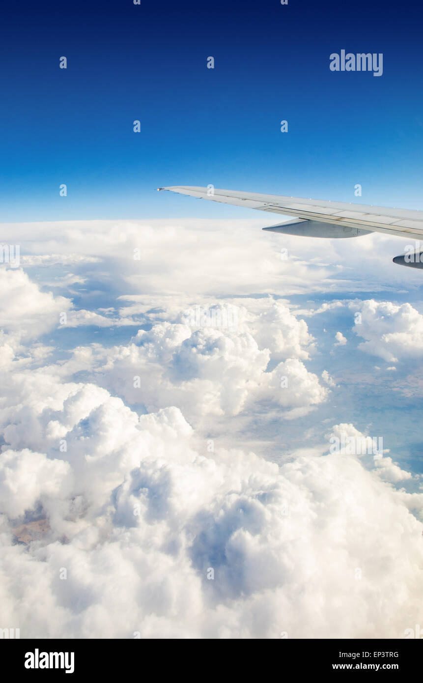 Airplane wing out of window Stock Photo - Alamy