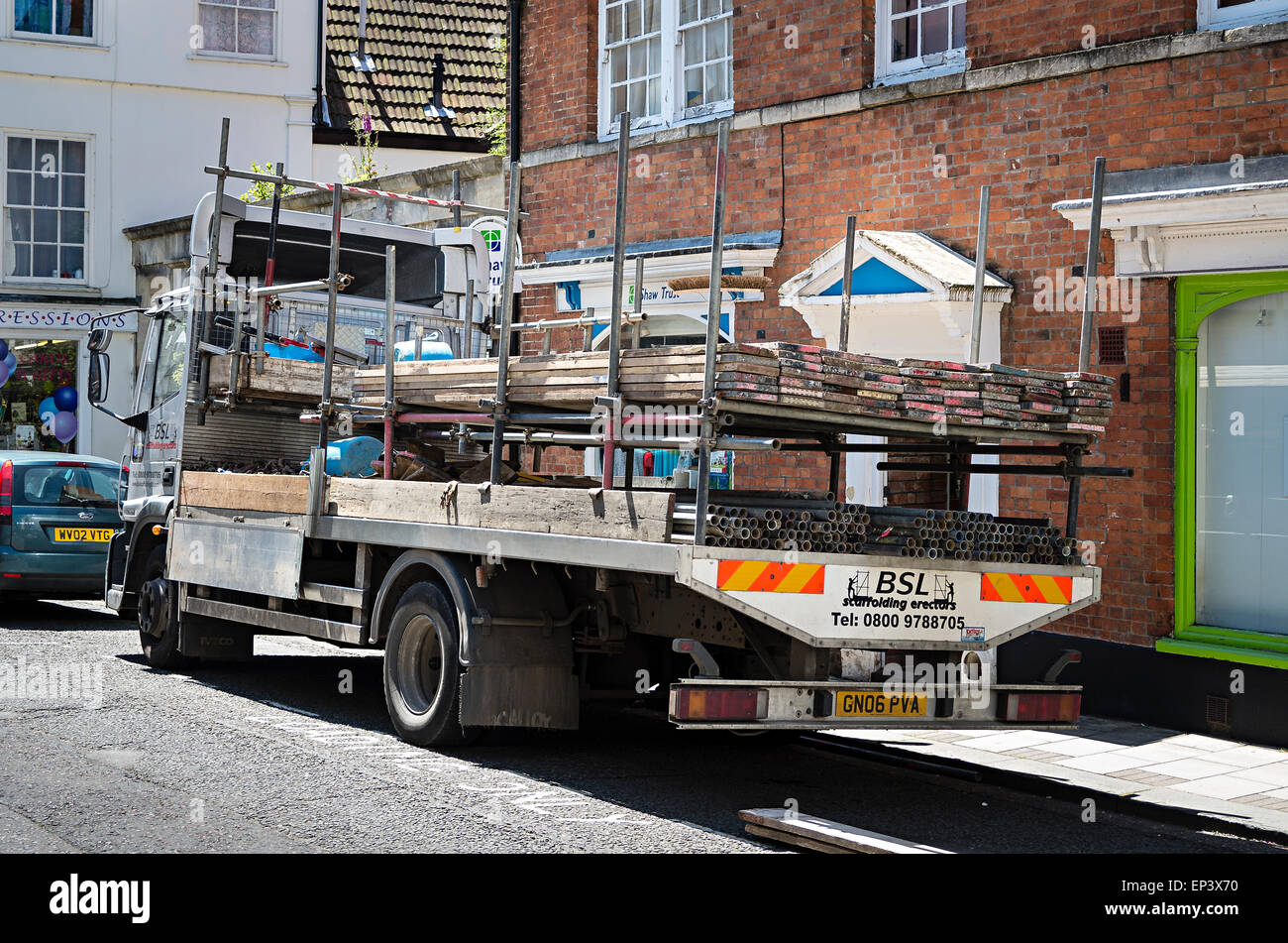 Scaffolding lorry attending new maintenance site in town Stock Photo ...