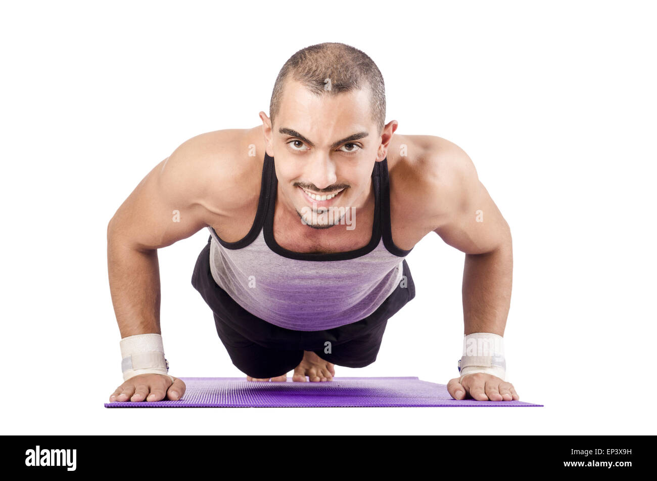 Man doing exercises on white Stock Photo - Alamy