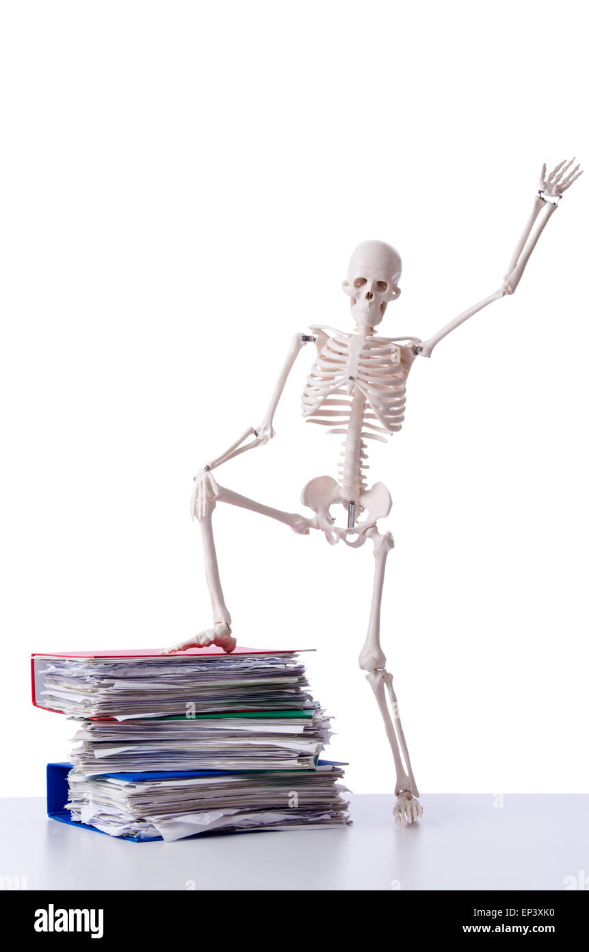 Skeleton with pile of files on white Stock Photo - Alamy