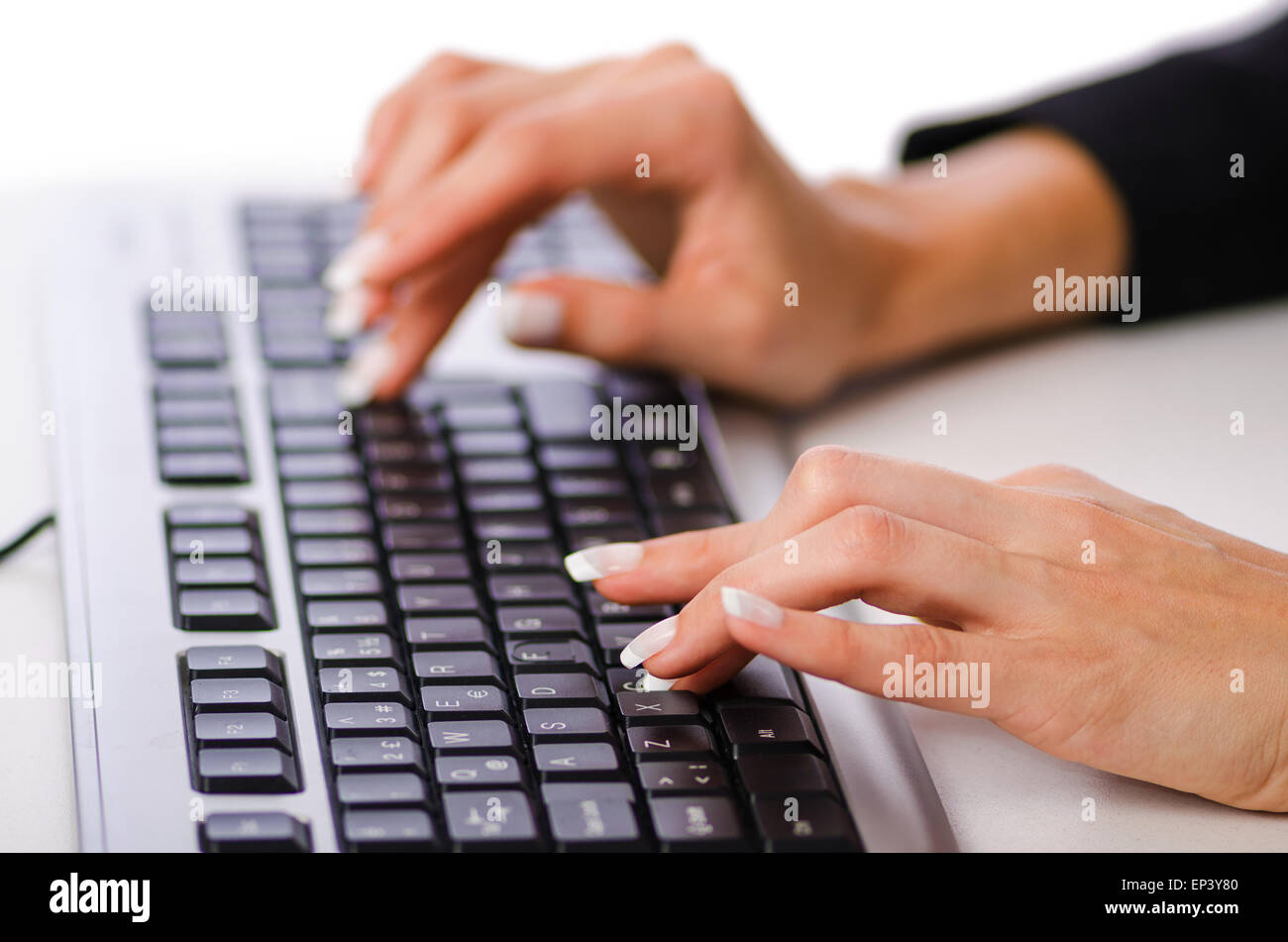 Hands working on the keyboard Stock Photo - Alamy