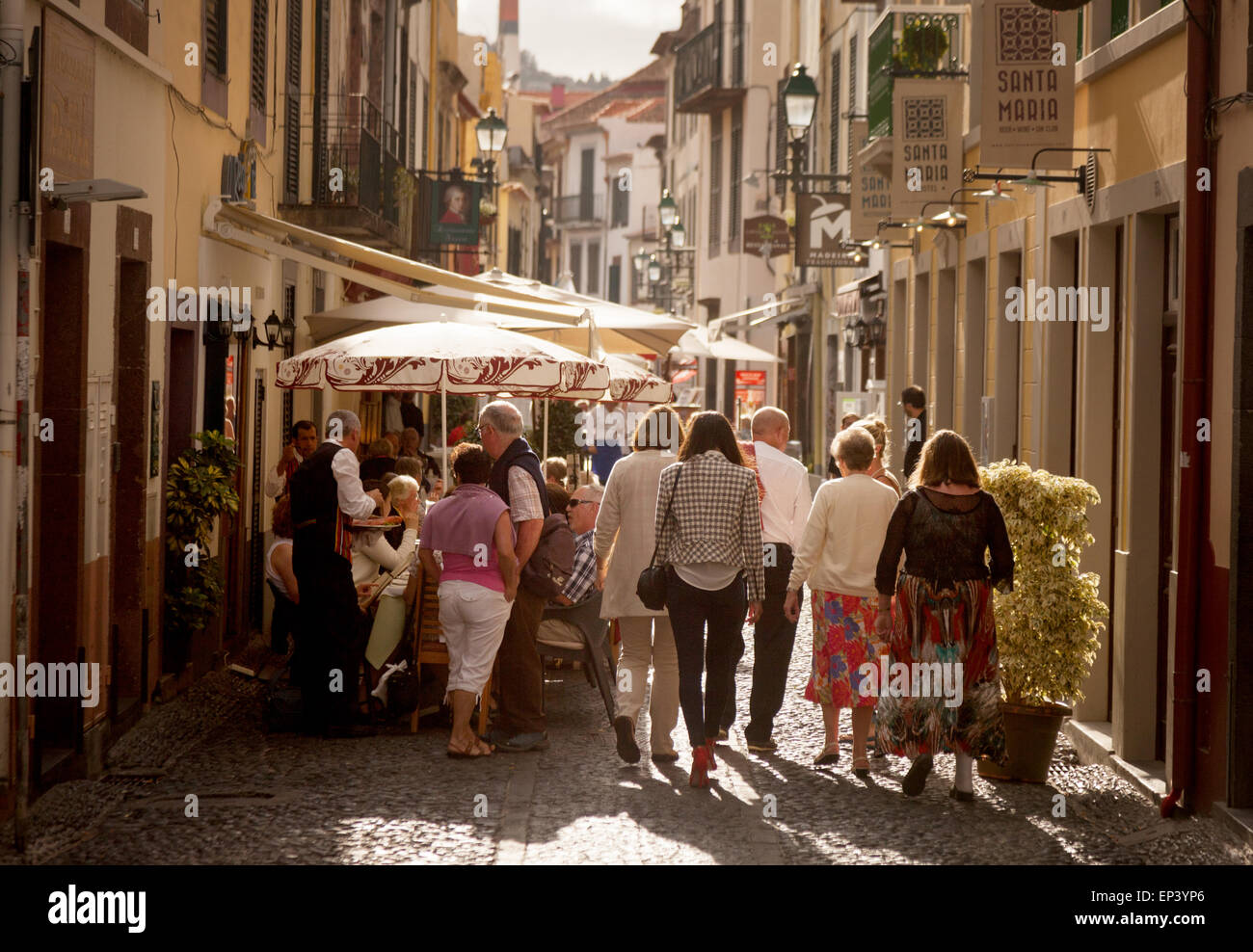 Tourists walking in Rua Santa Maria, the Old Town ( Zona Velha ...