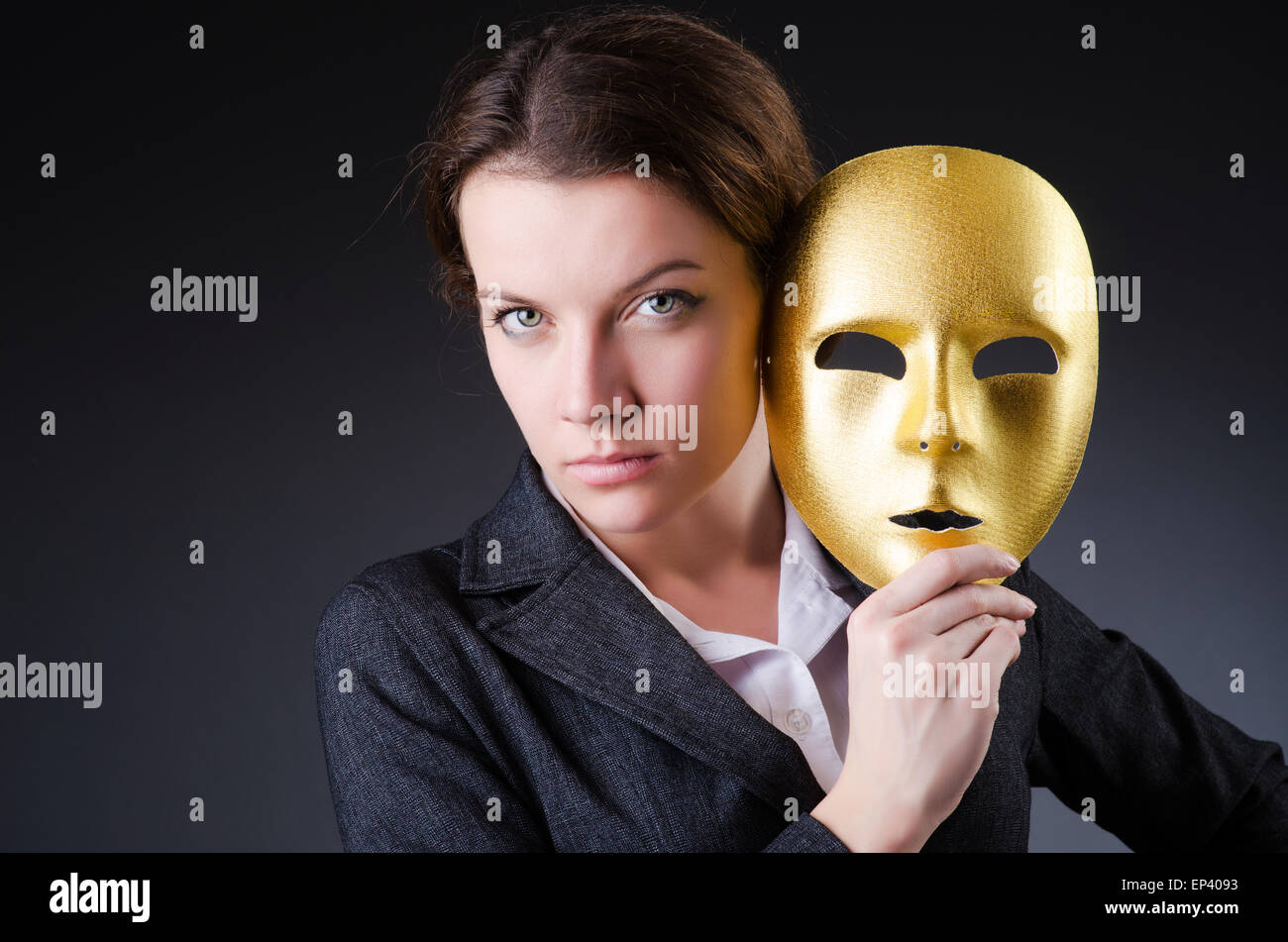 Woman with mask in hypocrisy concept Stock Photo - Alamy