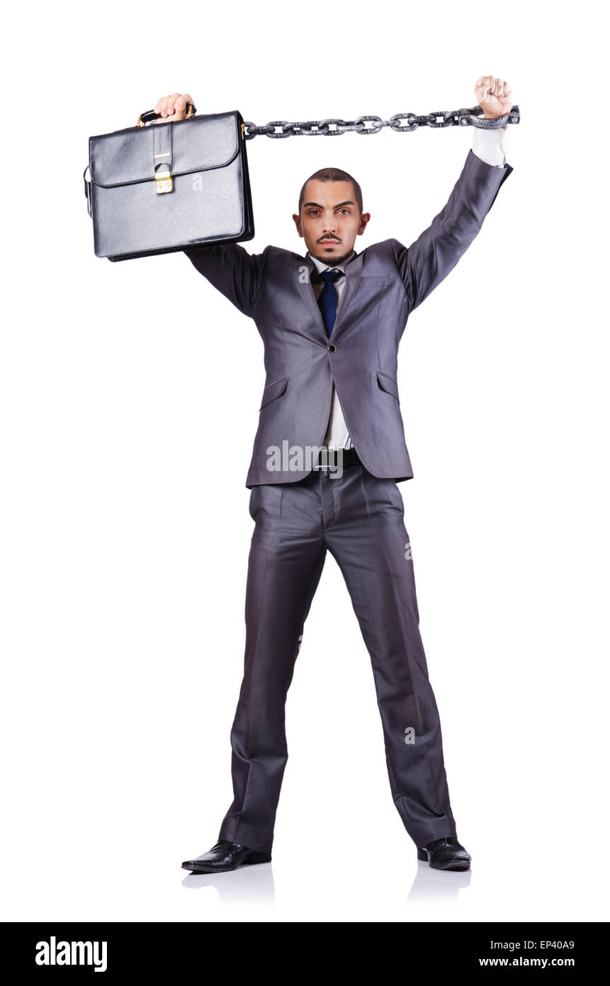 Businessman with shackles on white Stock Photo - Alamy