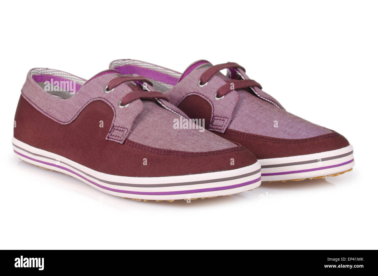 Sporty shoes in sport shoes concept on white Stock Photo - Alamy