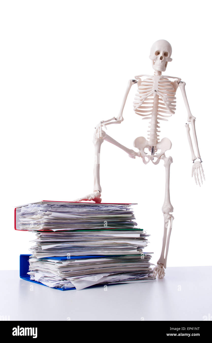 Skeleton with pile of files on white Stock Photo - Alamy