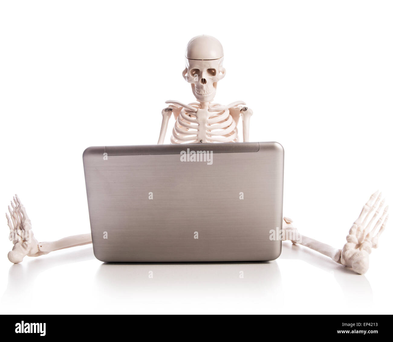 Skeleton working on laptop hi-res stock photography and images - Alamy