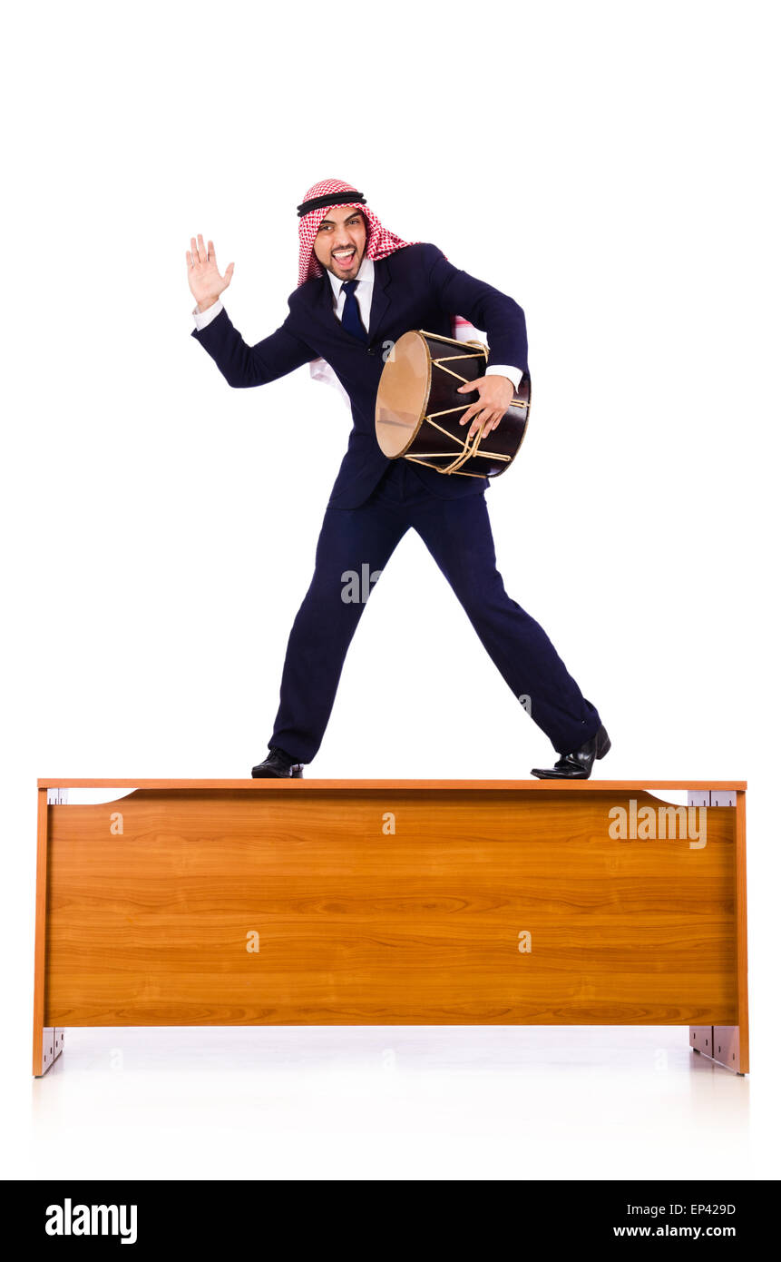 Arab businessman playing drum on desk Stock Photo - Alamy