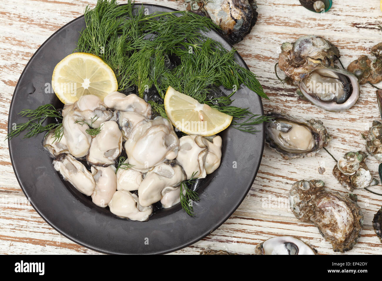 Oyster seafood lemon fresh mussel asia appetizer luxury Stock Photo - Alamy