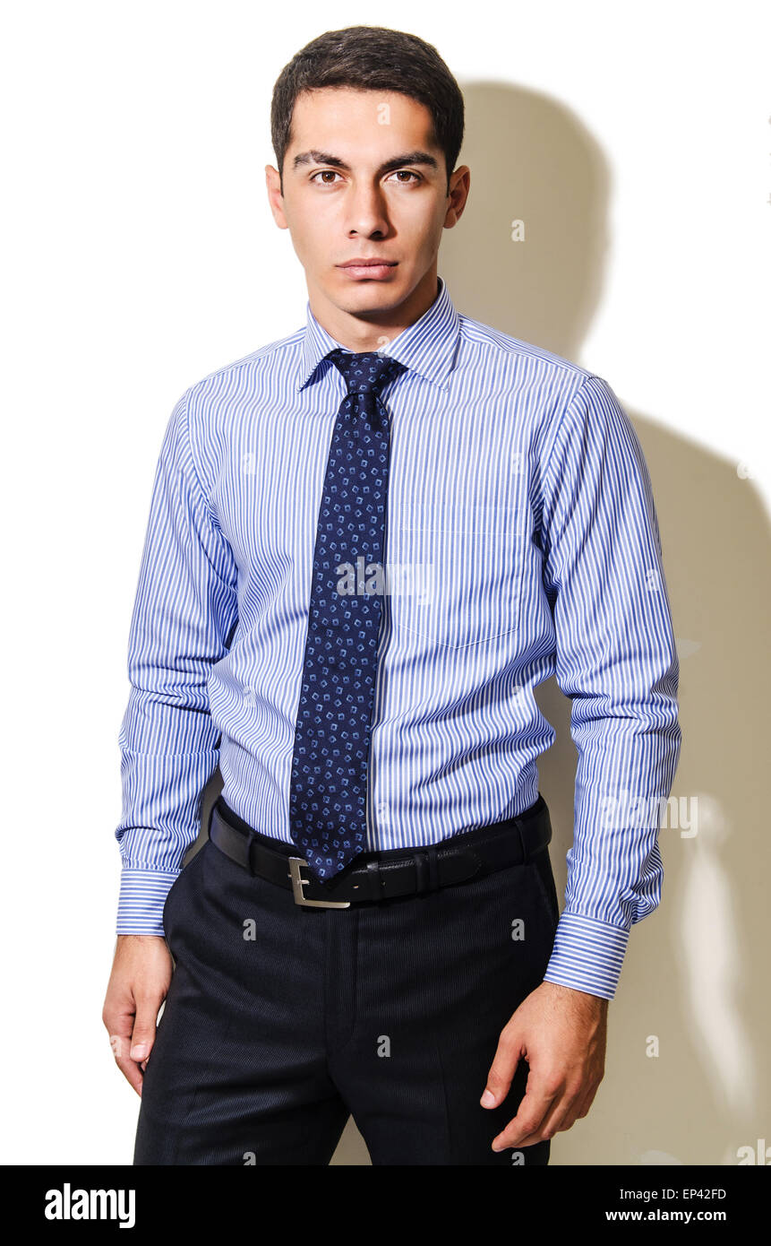 Male model with shirt isolated on white Stock Photo - Alamy