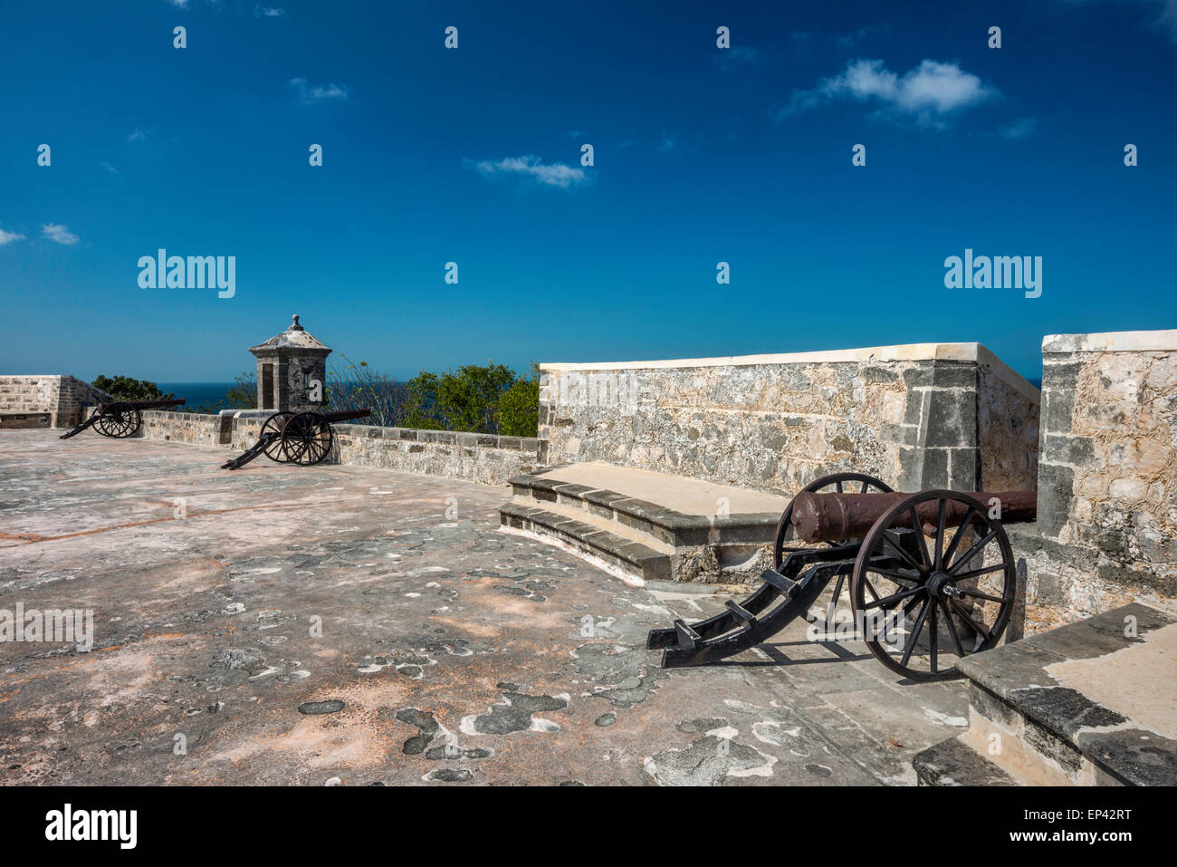 Cannon at battlement over Gulf of Mexico shoreline at Fuerte de San ...