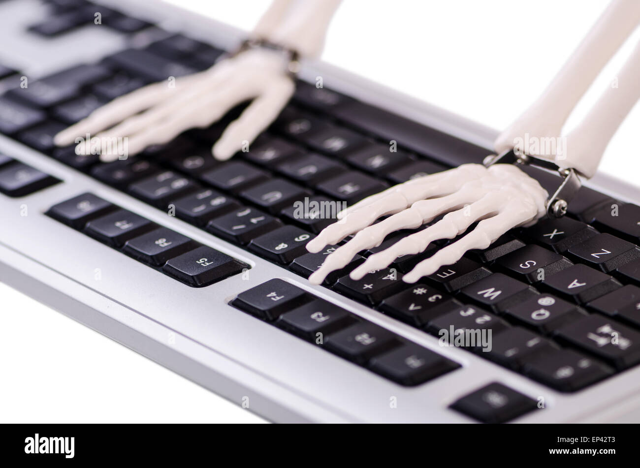 Skeleton working on the keyboard Stock Photo - Alamy