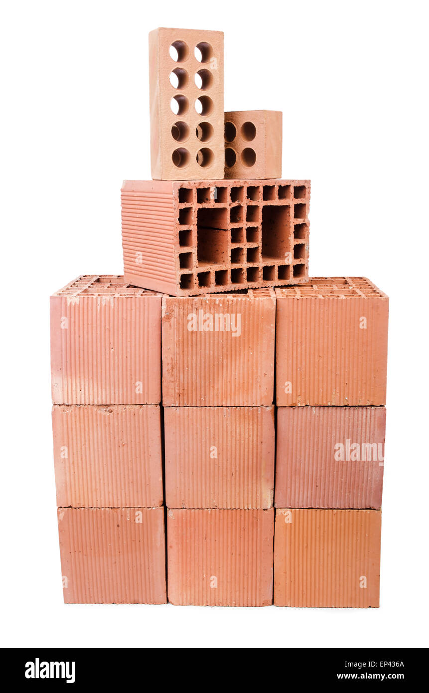 Stack of clay bricks isolated on white Stock Photo - Alamy