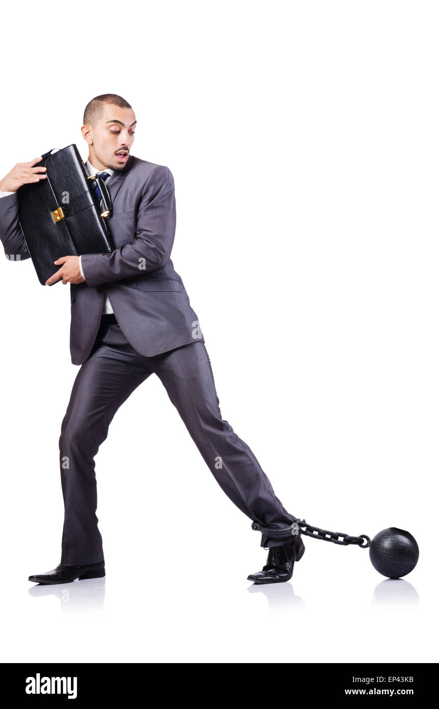 Businessman with shackles on white Stock Photo - Alamy