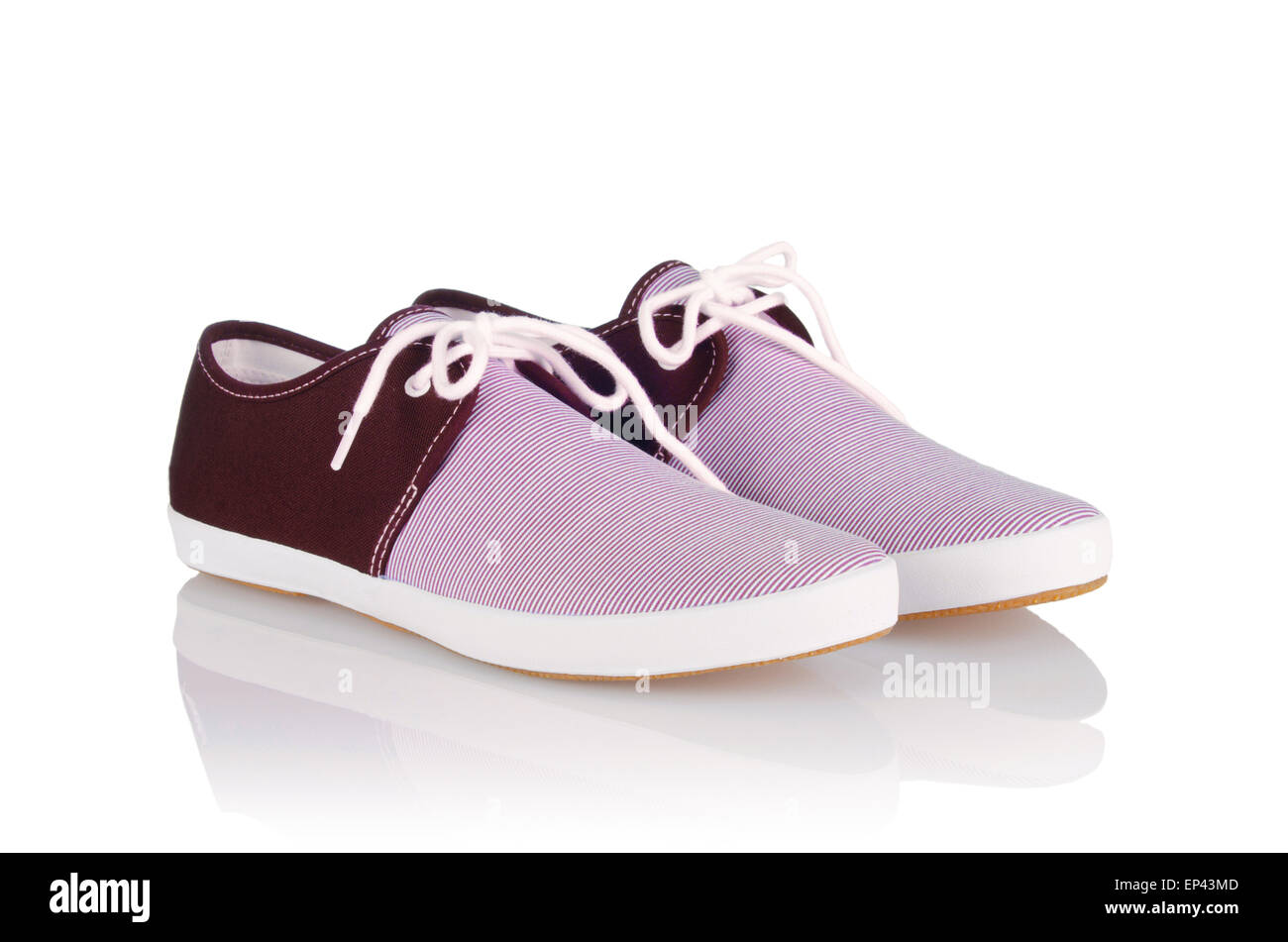 Sporty shoes in sport shoes concept on white Stock Photo - Alamy