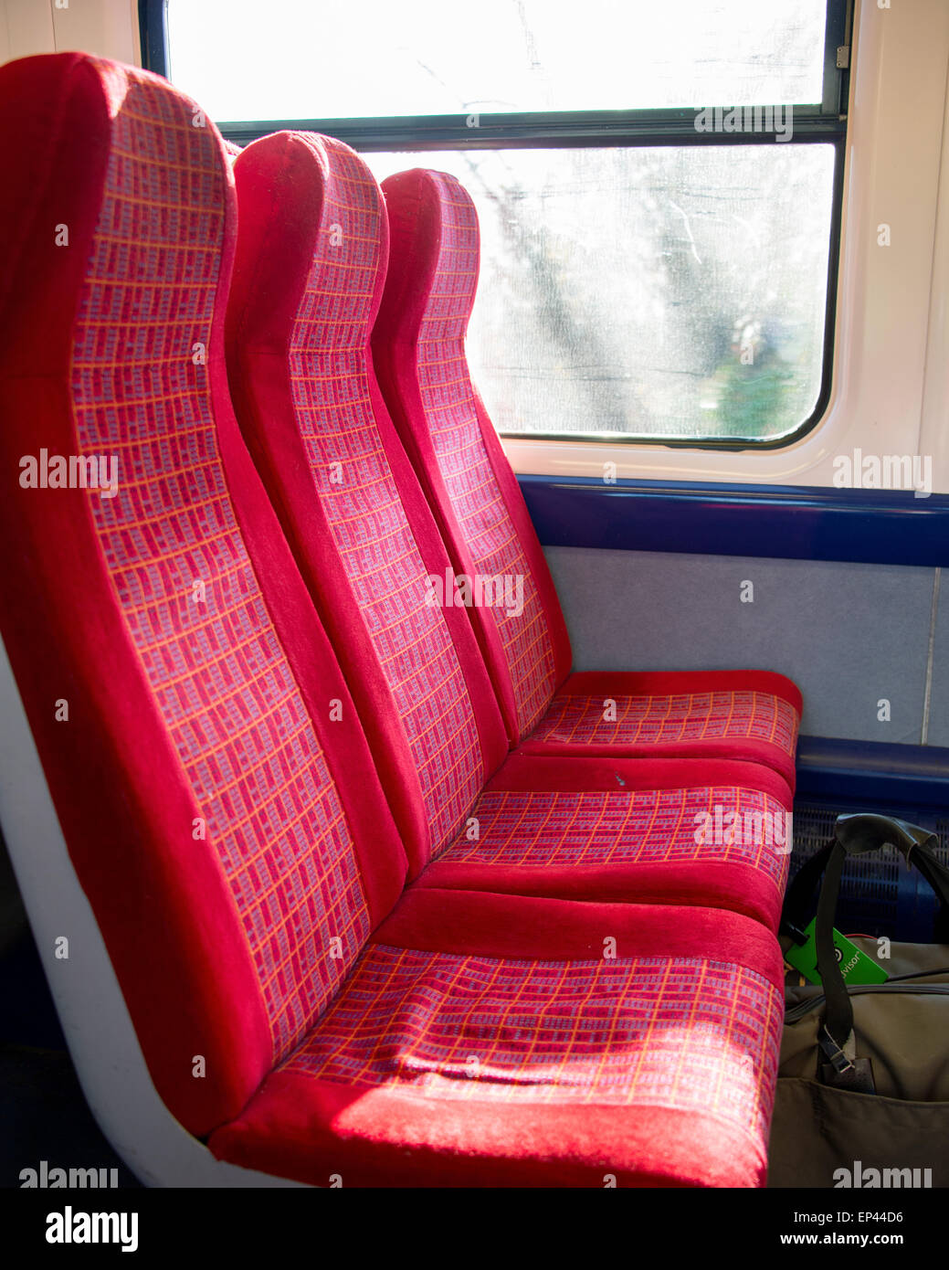 Row of red seats in the train Stock Photo - Alamy