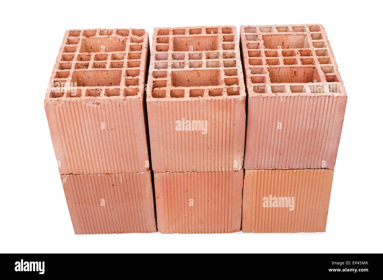 Stack of clay bricks isolated on white Stock Photo - Alamy