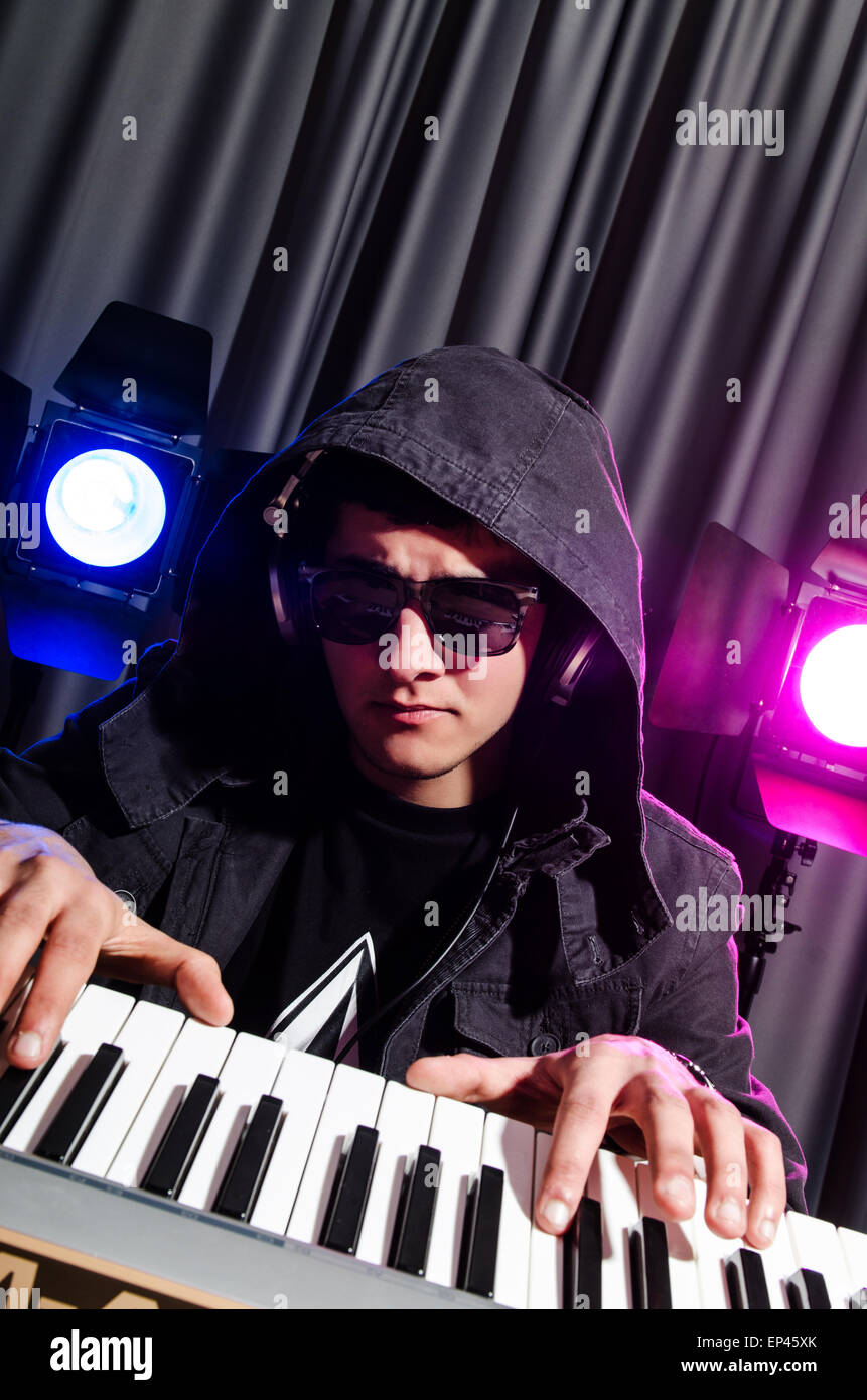 DJ mixing music at disco Stock Photo - Alamy