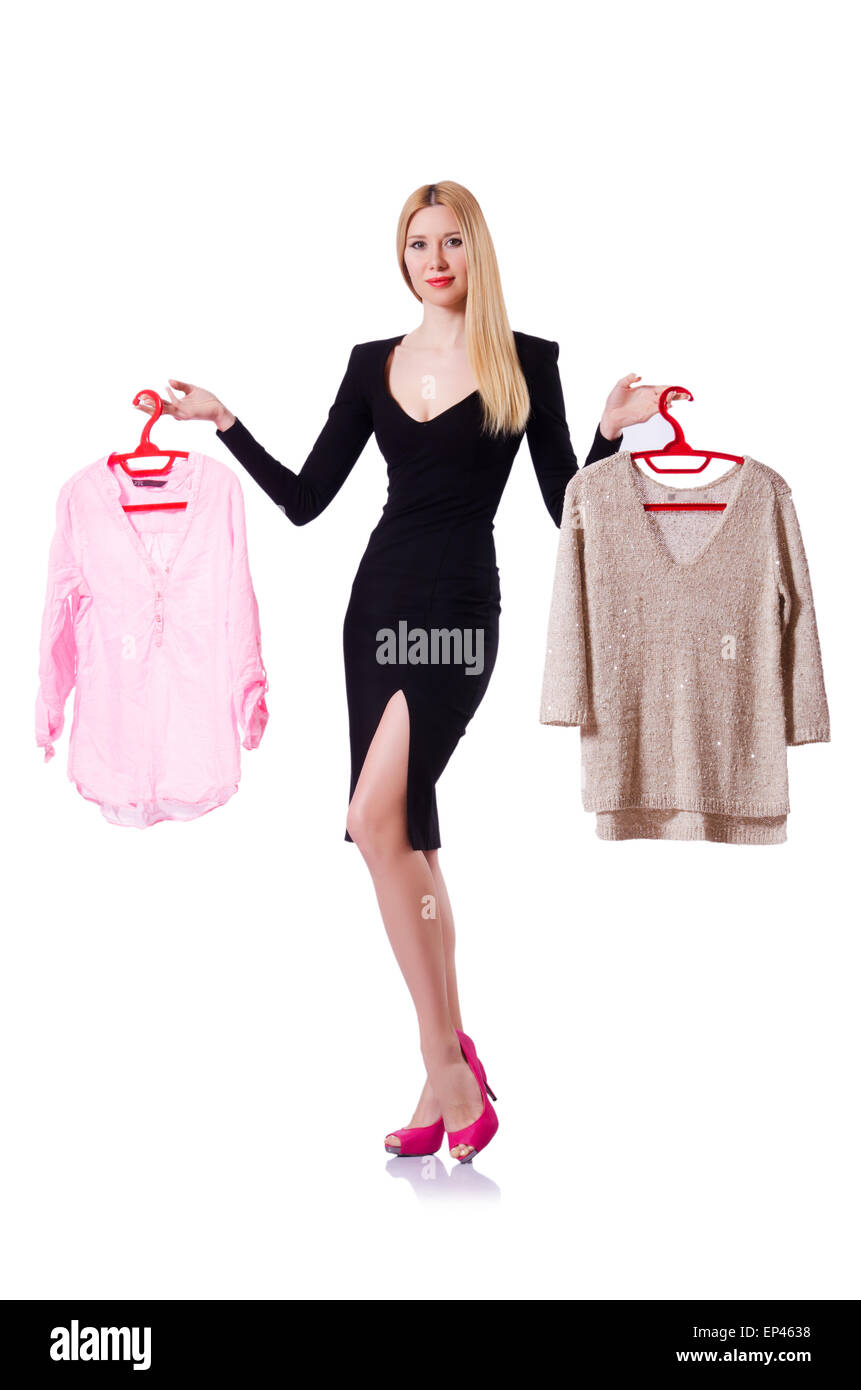 Woman trying to choose dress on white Stock Photo - Alamy