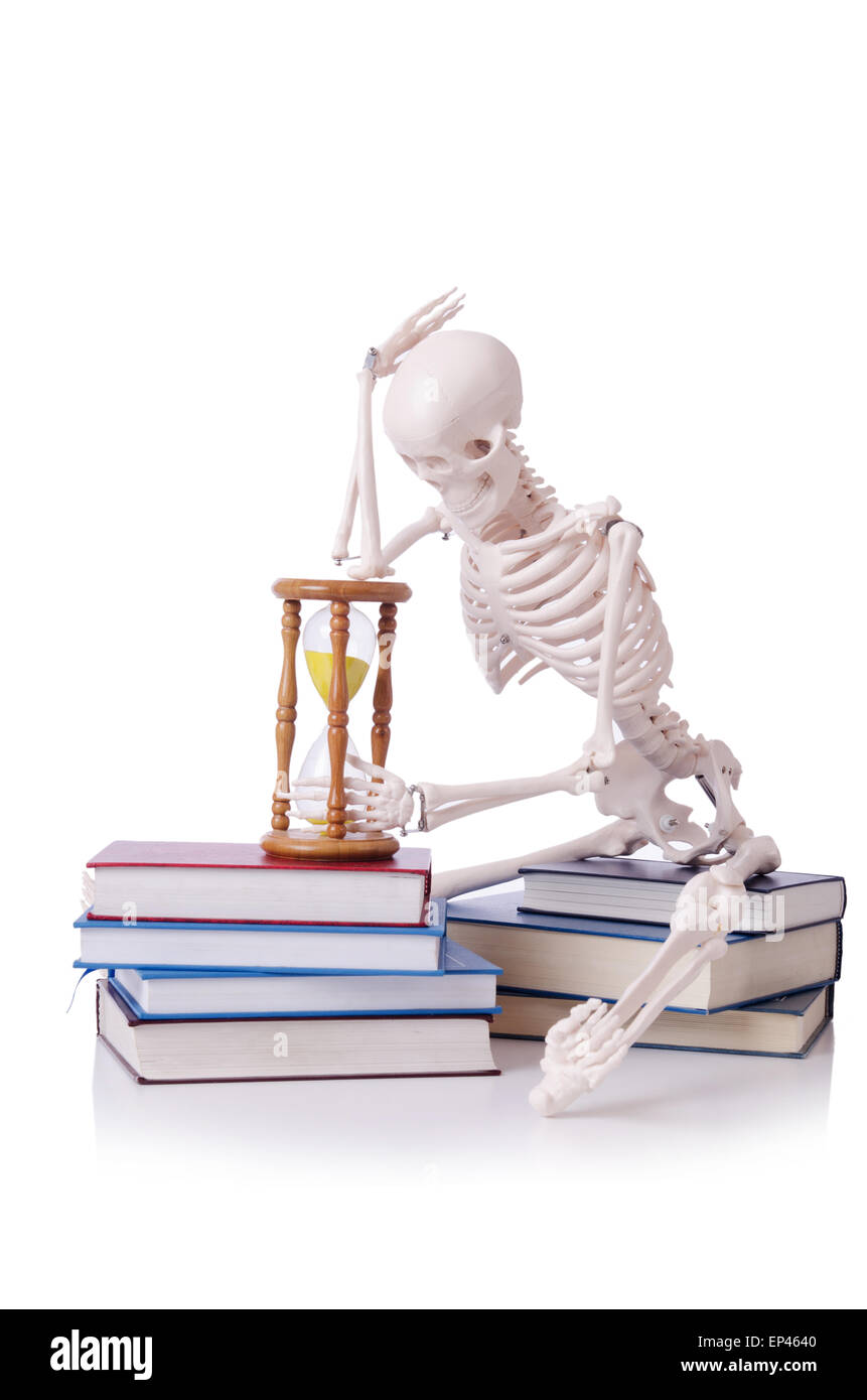 Skeleton reading books on white Stock Photo - Alamy