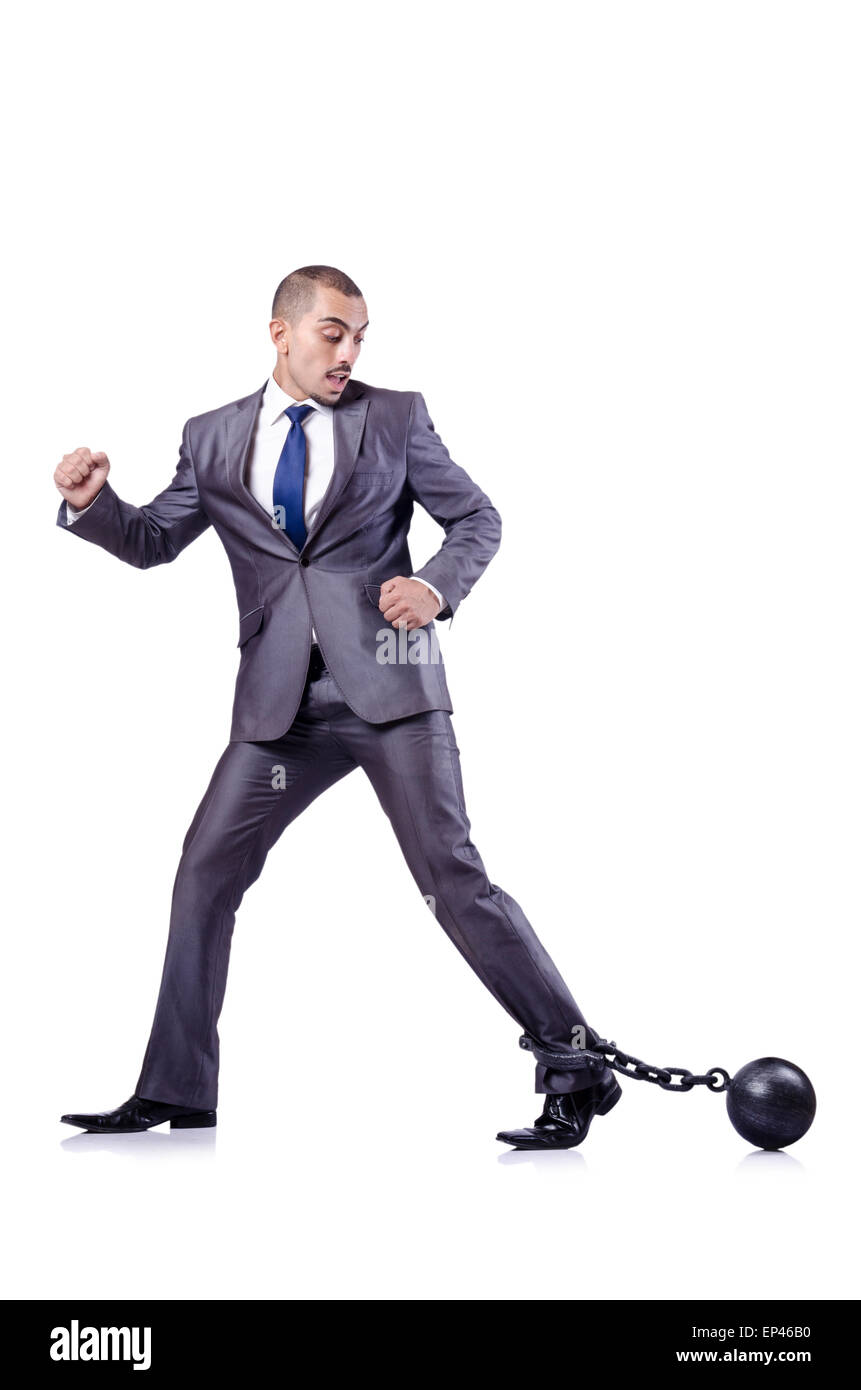 Businessman with shackles on white Stock Photo - Alamy