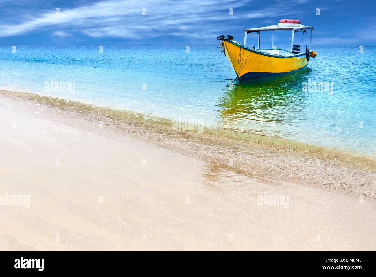 Yellow Boat at Beach Stock Photo - Alamy