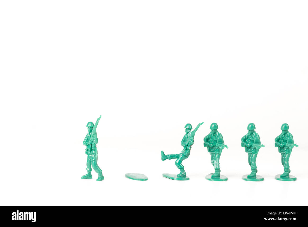 Green army leader steps off his foot stand and others follow Stock ...