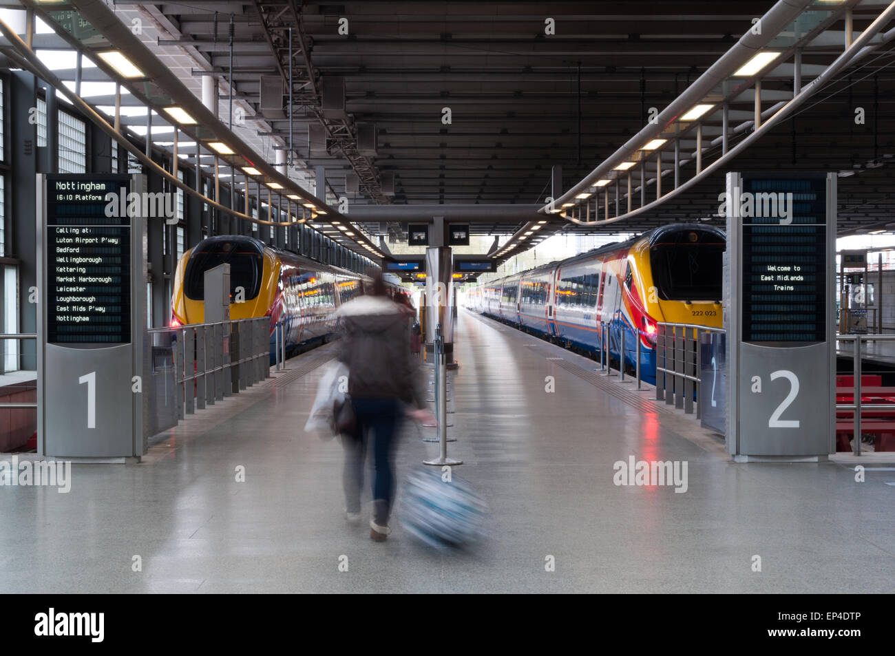 Train passengers walk hi-res stock photography and images - Alamy
