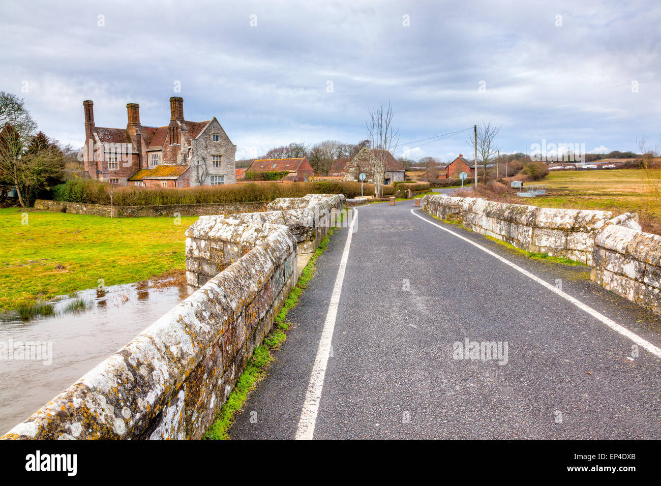 The River Frome and the historic Wool Bridge Dorset England UK Europe ...