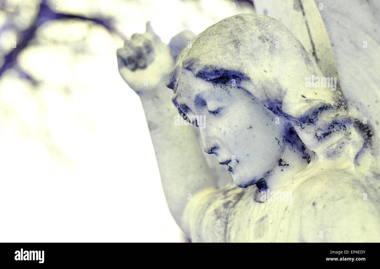 Close up of stone angel in the cemetery Stock Photo - Alamy