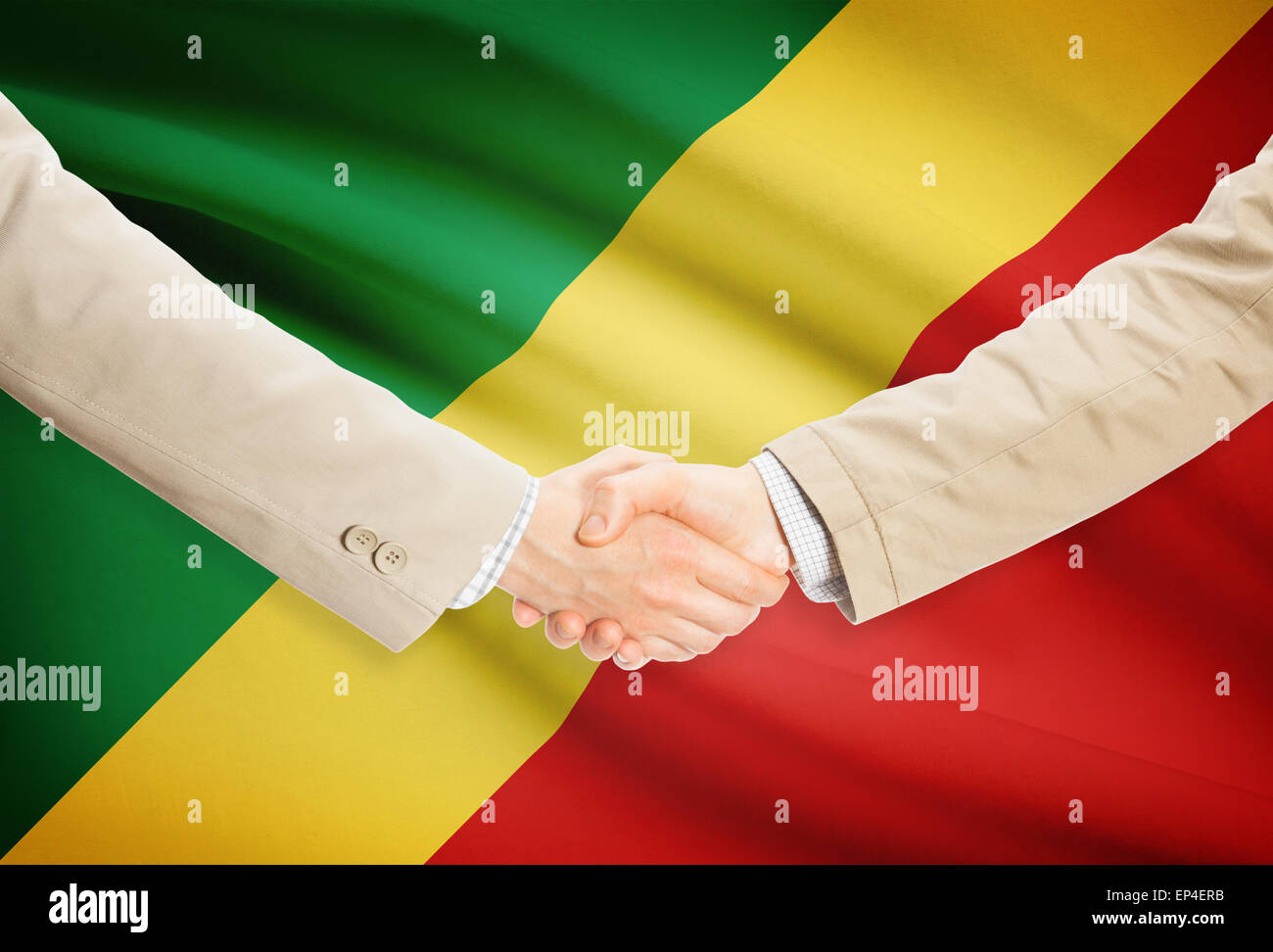 Businessmen shaking hands with flag on background - Republic of the ...