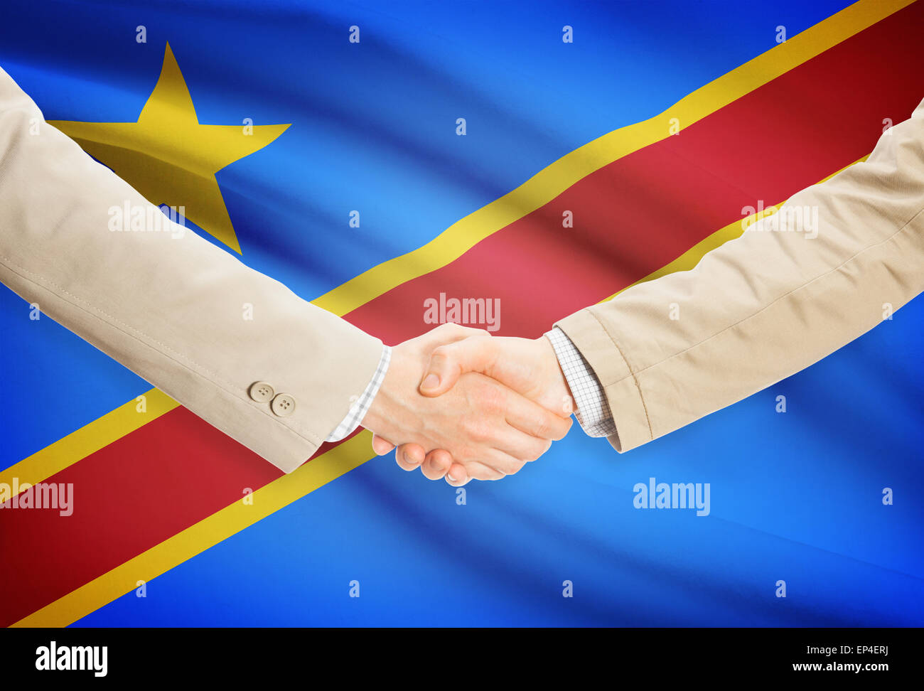 Businessmen shaking hands with flag on background - Democratic Republic ...