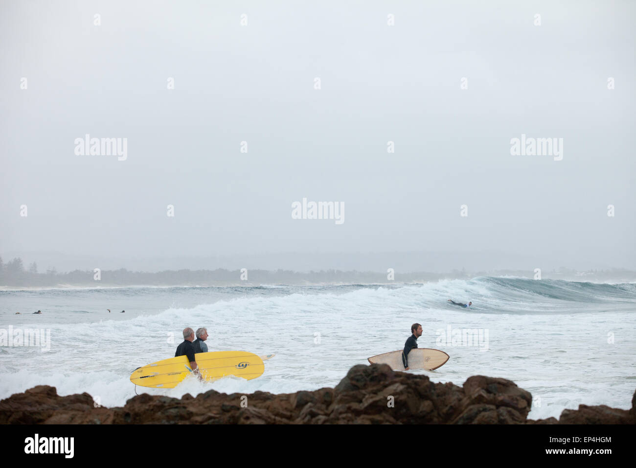 Group surfers walking out ocean hi-res stock photography and images - Alamy