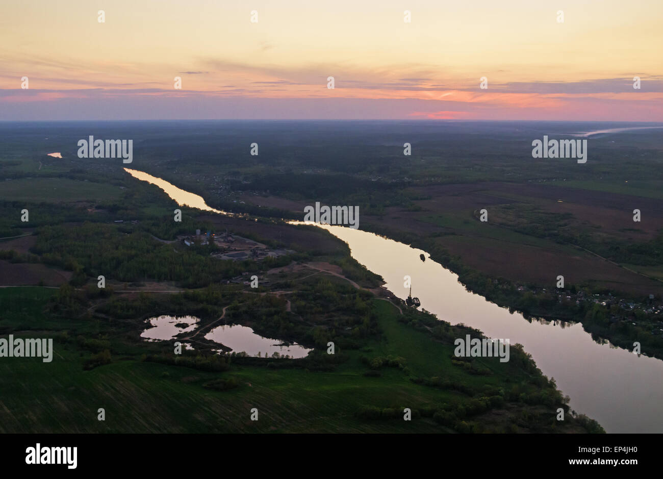 Evening village, roads and river aerial view Stock Photo - Alamy