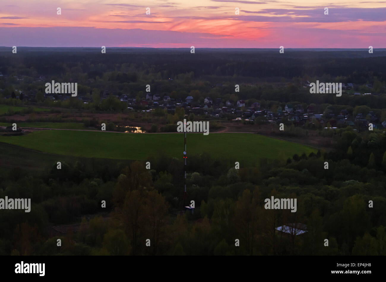 Evening village, roads and field aerial view Stock Photo - Alamy