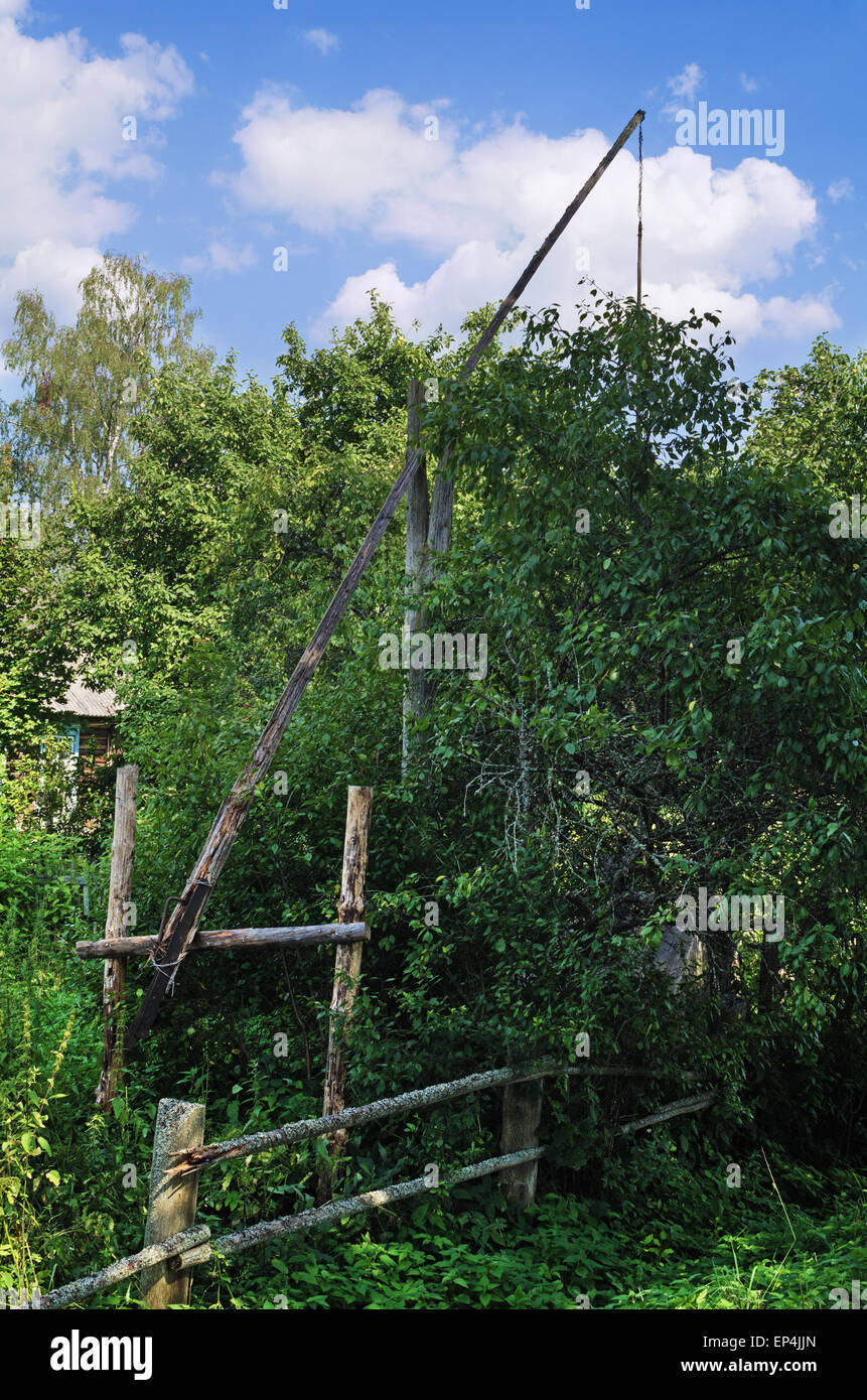 Village landscape with well Stock Photo - Alamy
