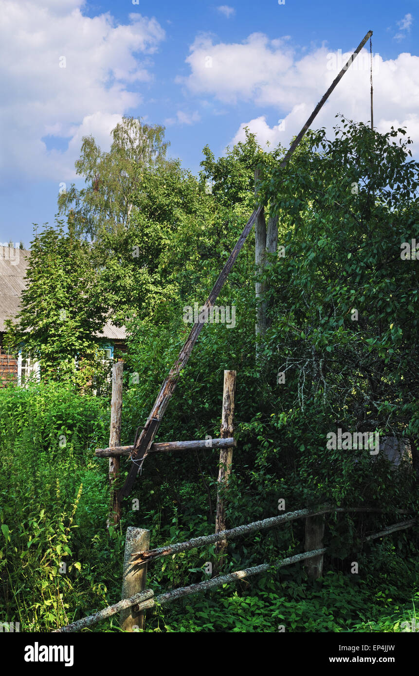 Village landscape with well Stock Photo - Alamy