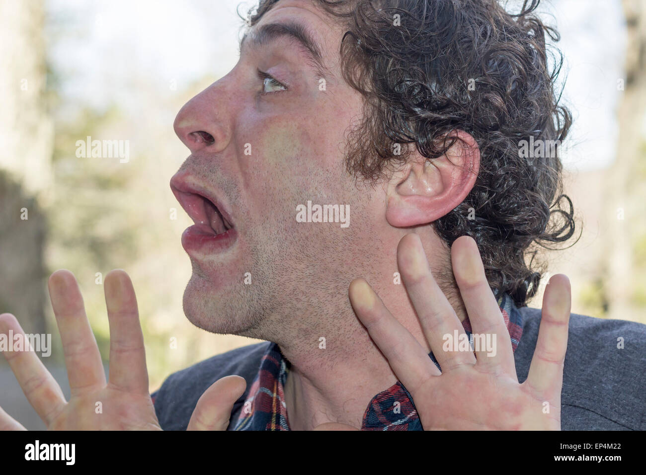 Crazy lunatic man smooshes face against glass surfaces Stock Photo - Alamy