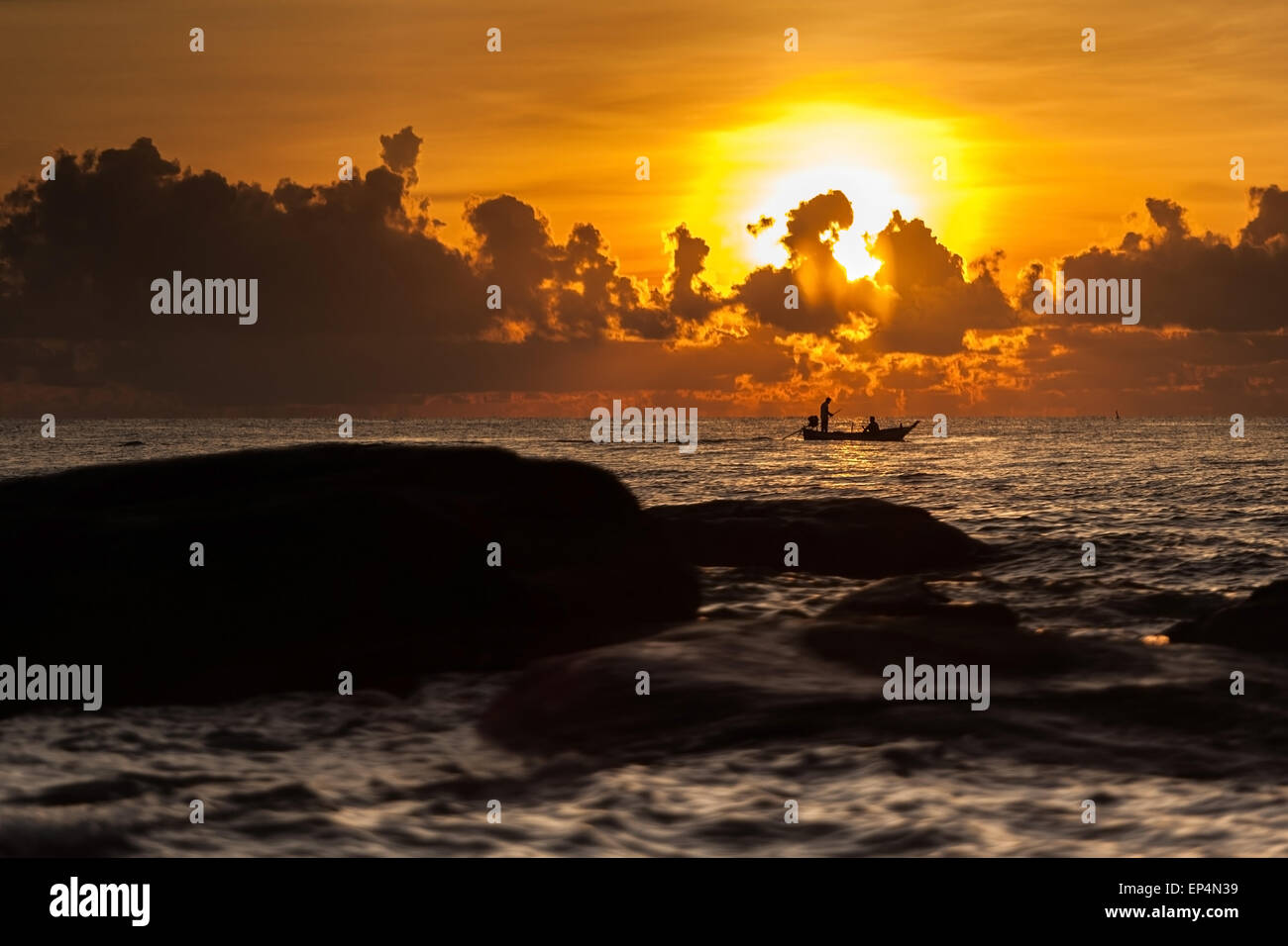 A little boat in sunset on the sea Stock Photo - Alamy