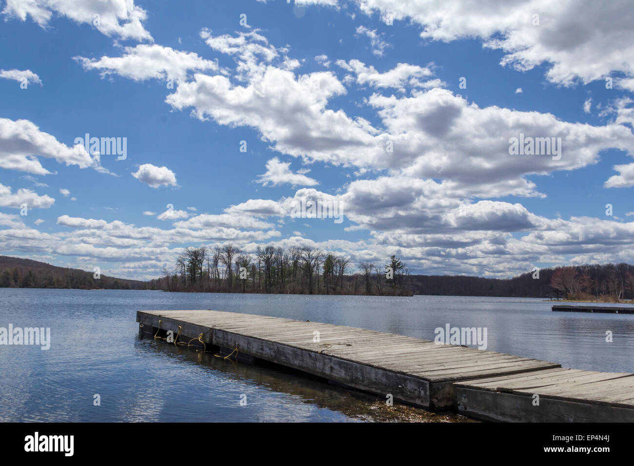 Dock stretches across Wawayanda Lake in early springtime Stock Photo ...