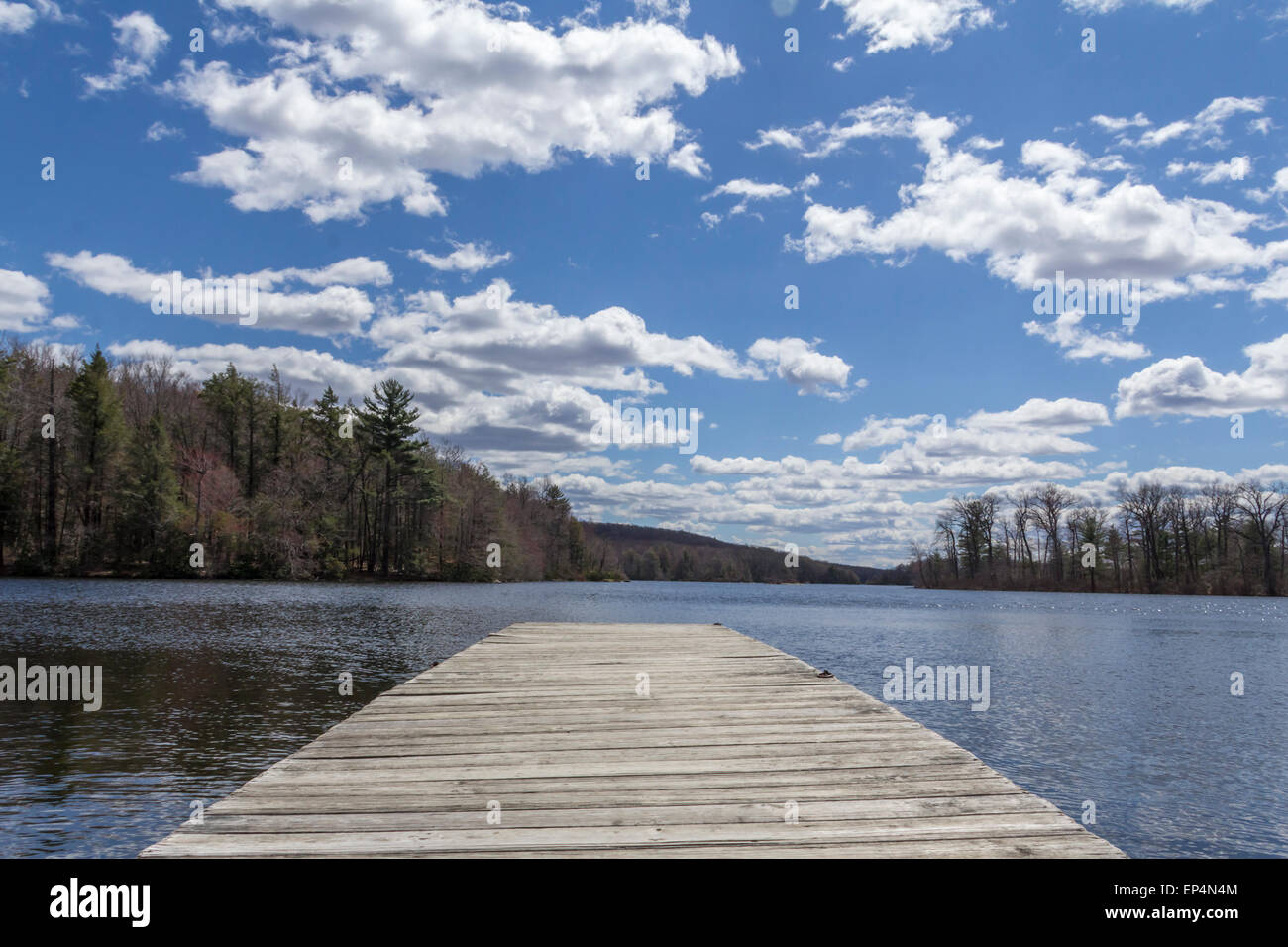 Dock stretches across Wawayanda Lake in early springtime Stock Photo ...