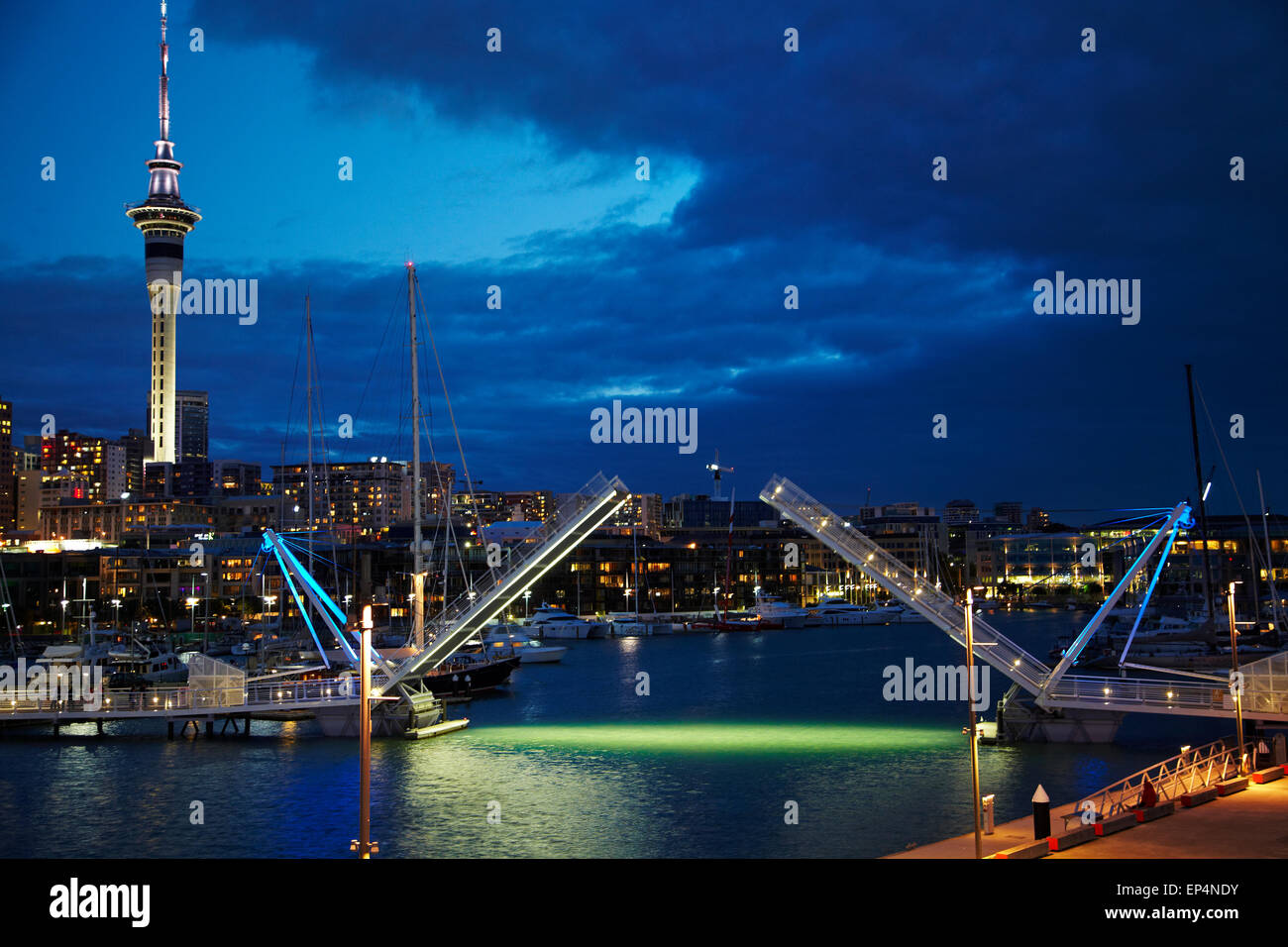 Wynyard Crossing bridge, and Skytower, Auckland waterfront, North ...