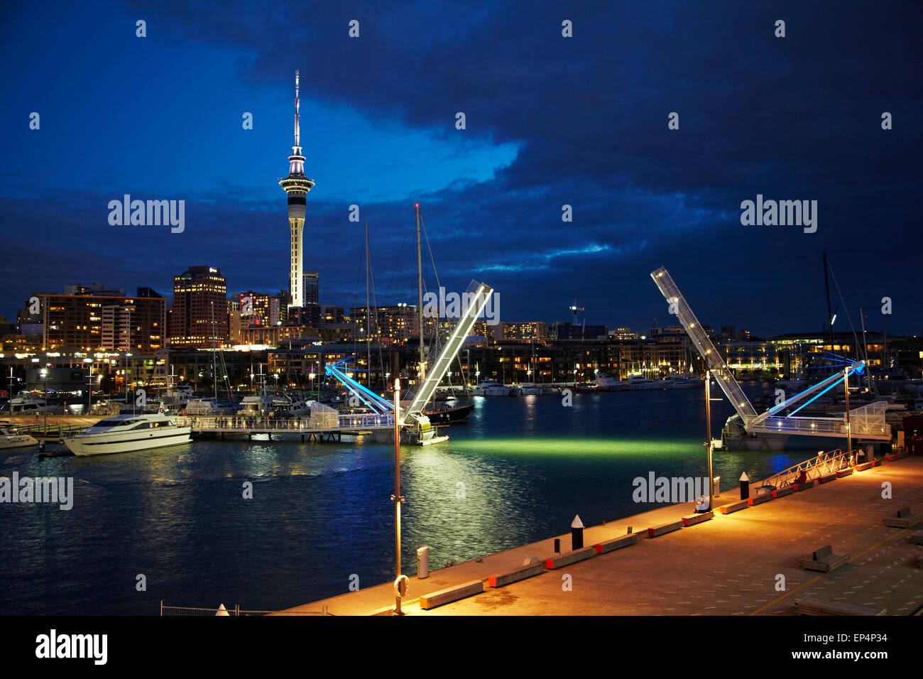 Wynyard Crossing bridge, and Skytower, Auckland waterfront, North ...