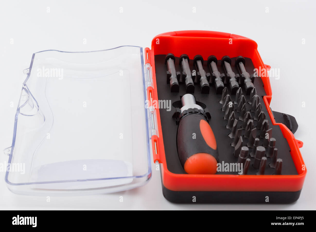 set of screw-drivers from a steel alloy in an open box on a white ...