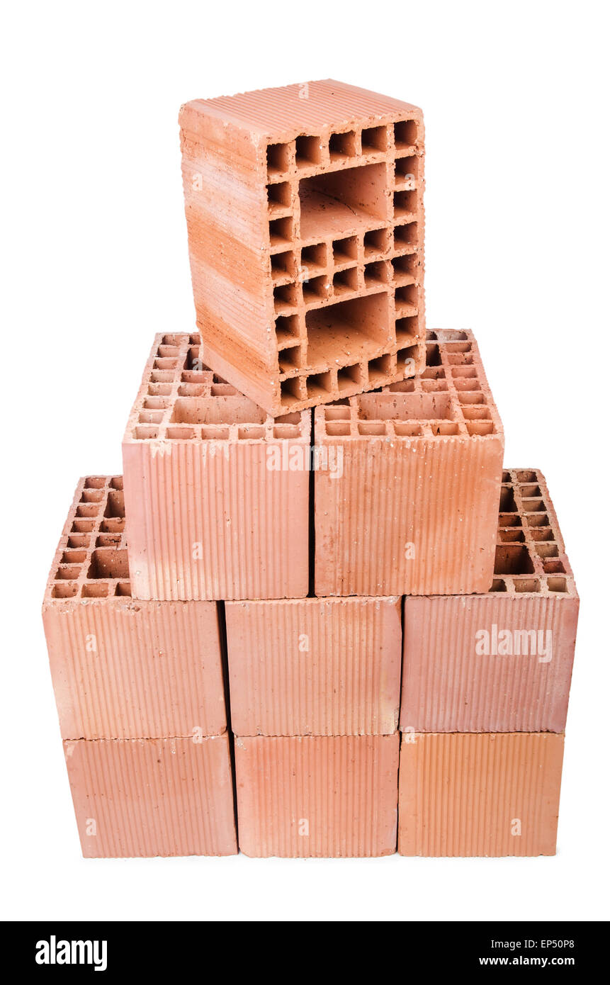 Stack of clay bricks isolated on white Stock Photo - Alamy