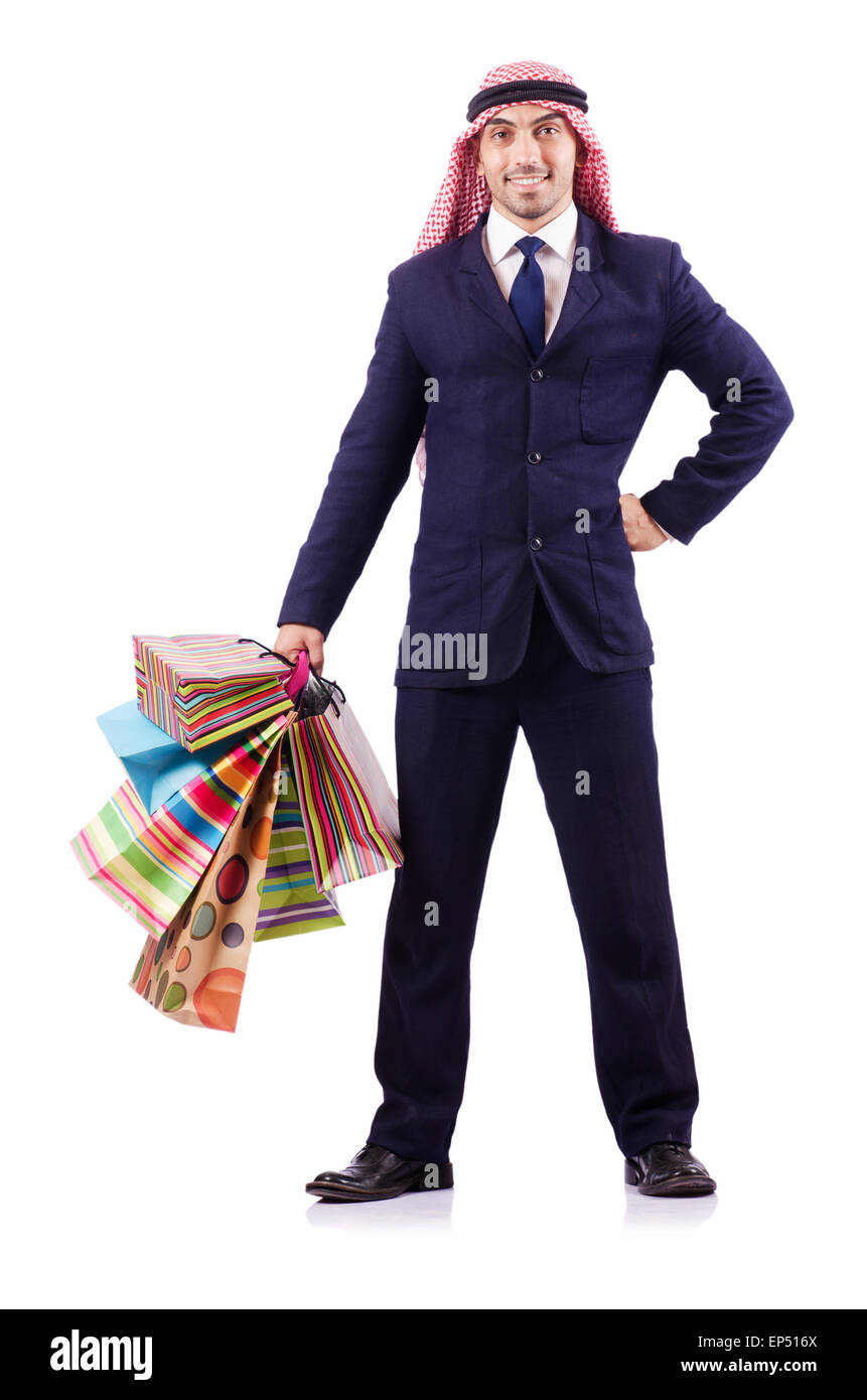 Arab man with shopping gifts on white Stock Photo - Alamy