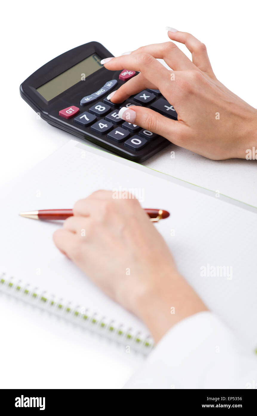 Hands working on the calculator Stock Photo - Alamy