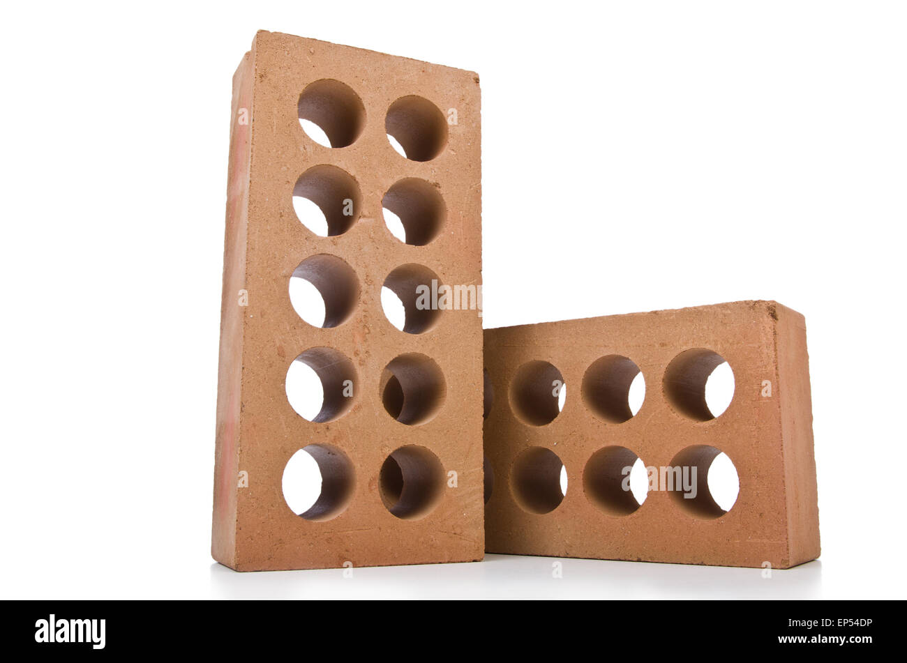 Stack of clay bricks isolated on white Stock Photo - Alamy